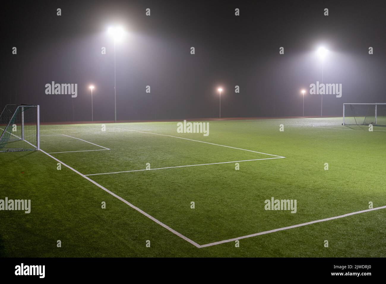 Image of soccer field in night with spotlight Stock Photo - Alamy