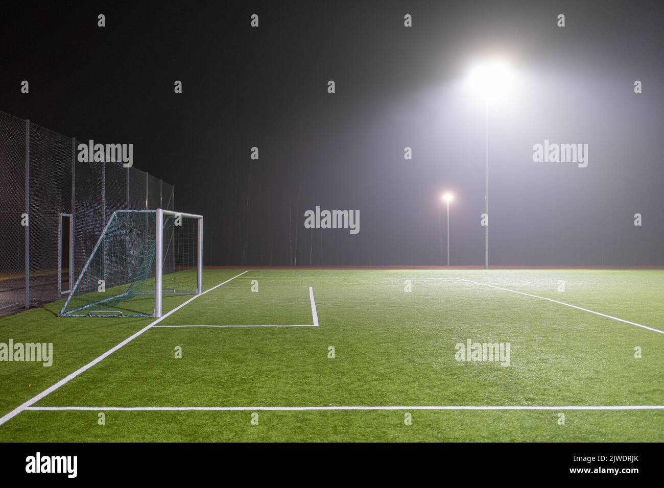 Image of soccer field in night with spotlight Stock Photo - Alamy