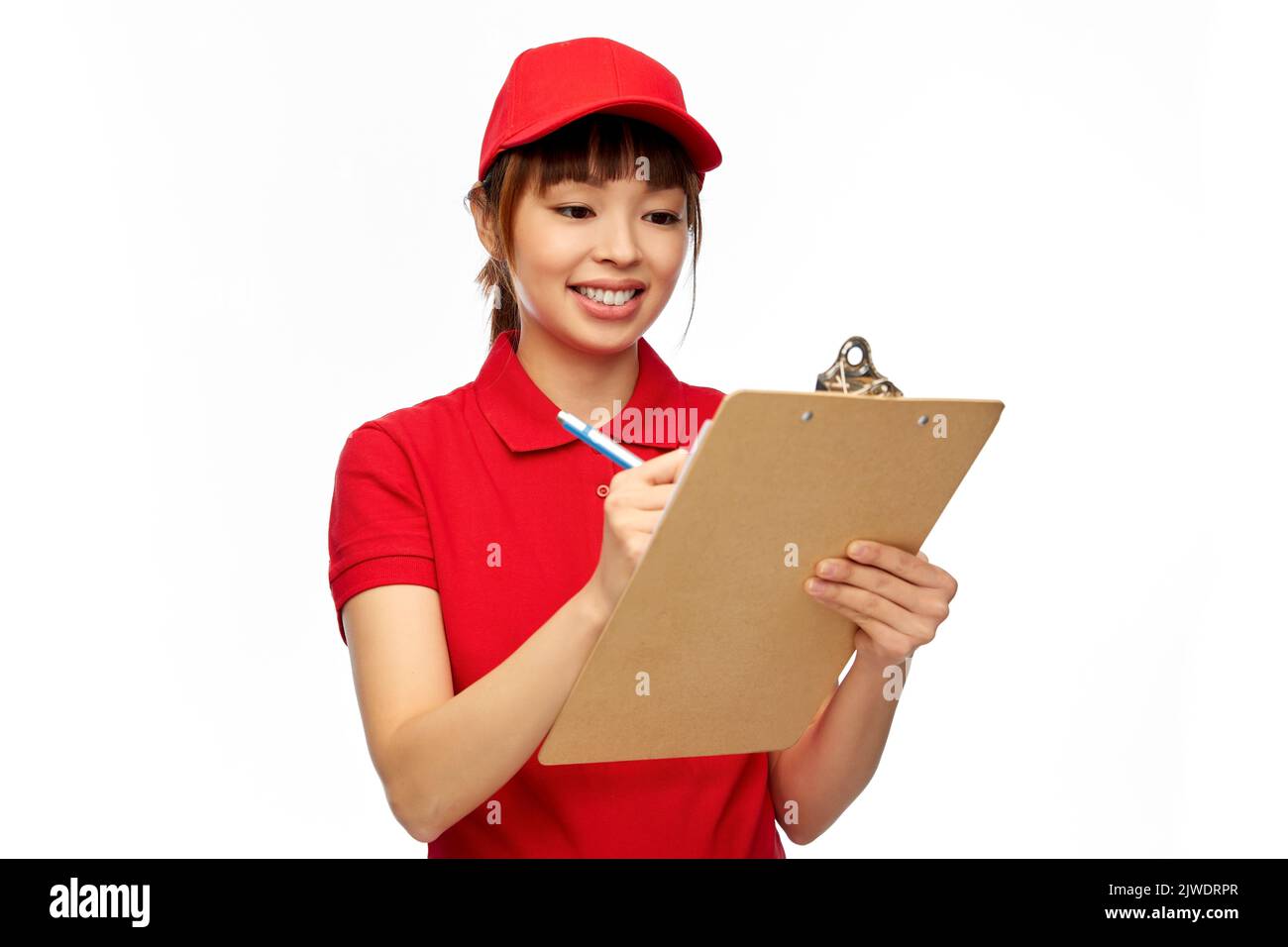 happy delivery woman with clipboard and pen Stock Photo - Alamy