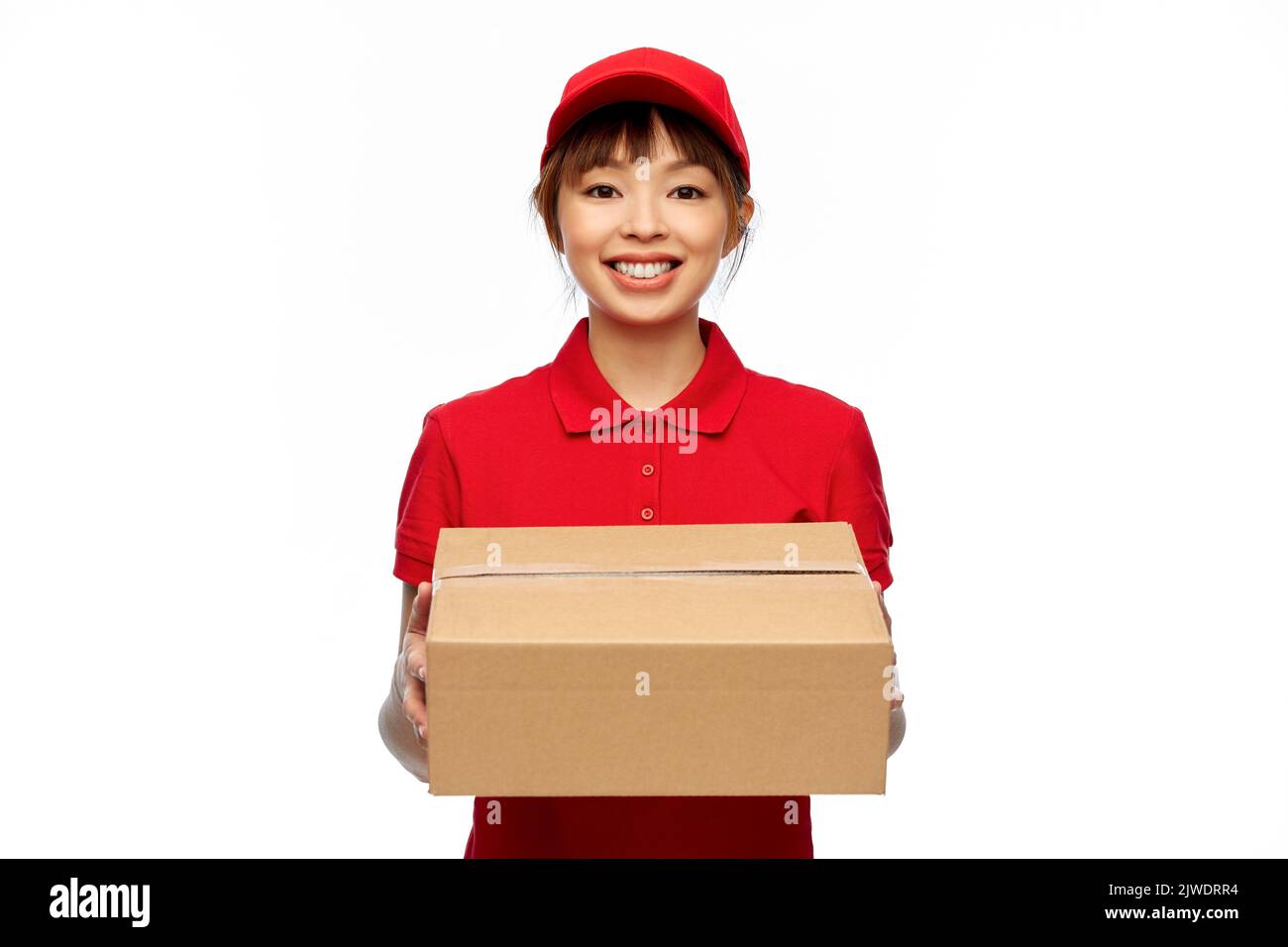happy smiling delivery woman holding parcel box Stock Photo - Alamy