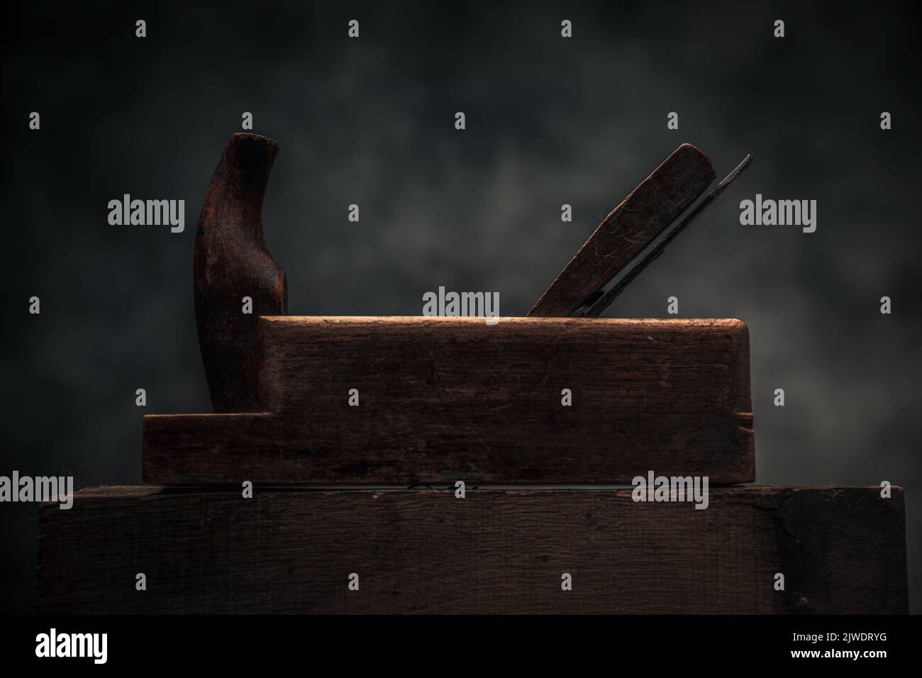 side view of manual wooden planer illustrating the concept of ...