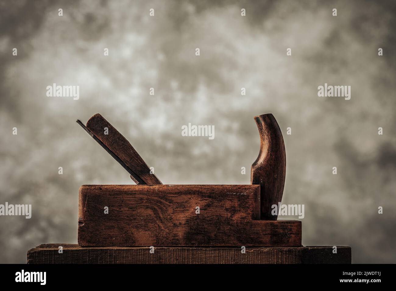 picture of vintage wooden planer on top of old rustic wooden workbench ...