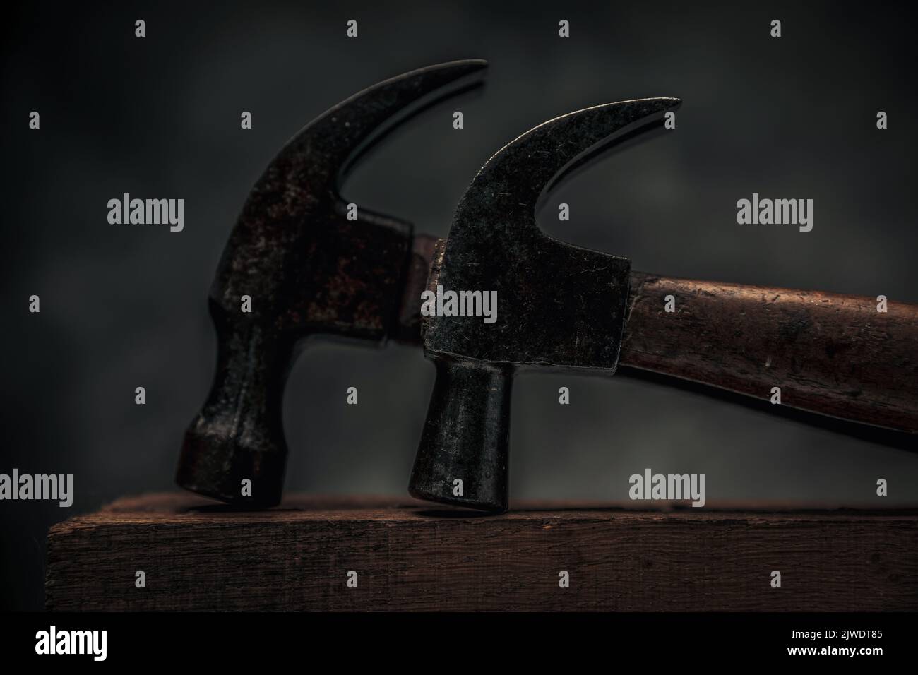 close up picture of two carpentry hammers for craftsmanship concept and ...