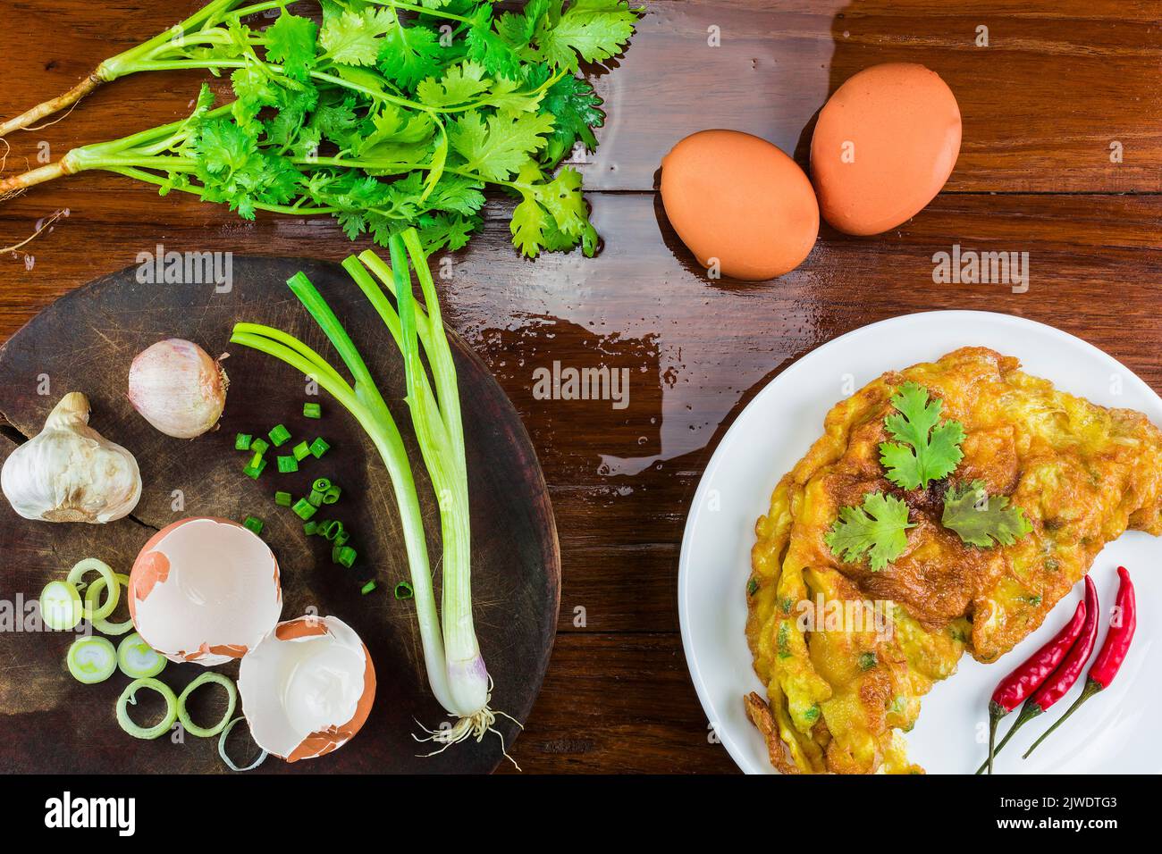 The ingredients of omelet are on the wooden floor Stock Photo - Alamy
