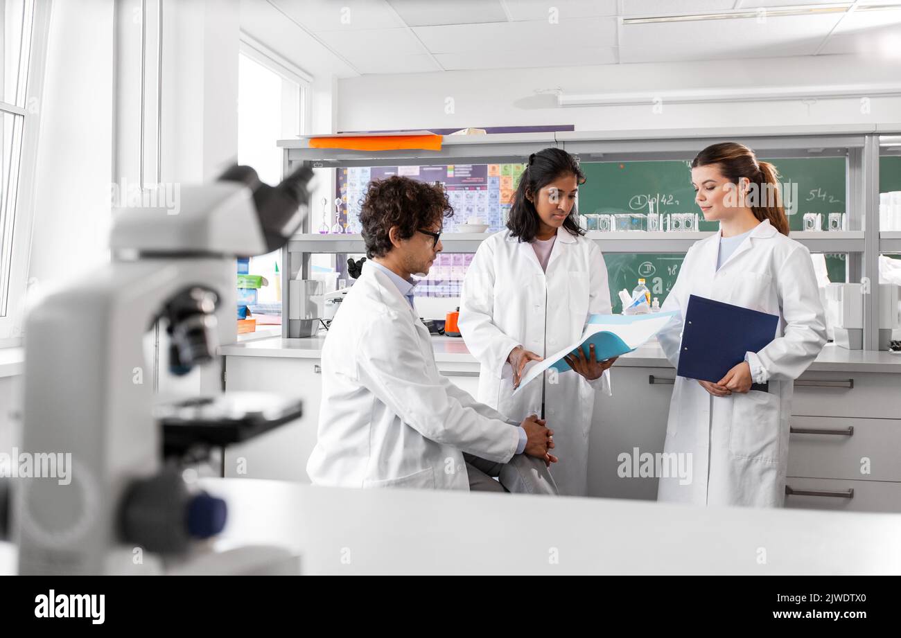 international group of scientists in laboratory Stock Photo - Alamy