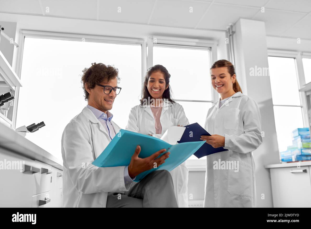 international group of scientists in laboratory Stock Photo - Alamy