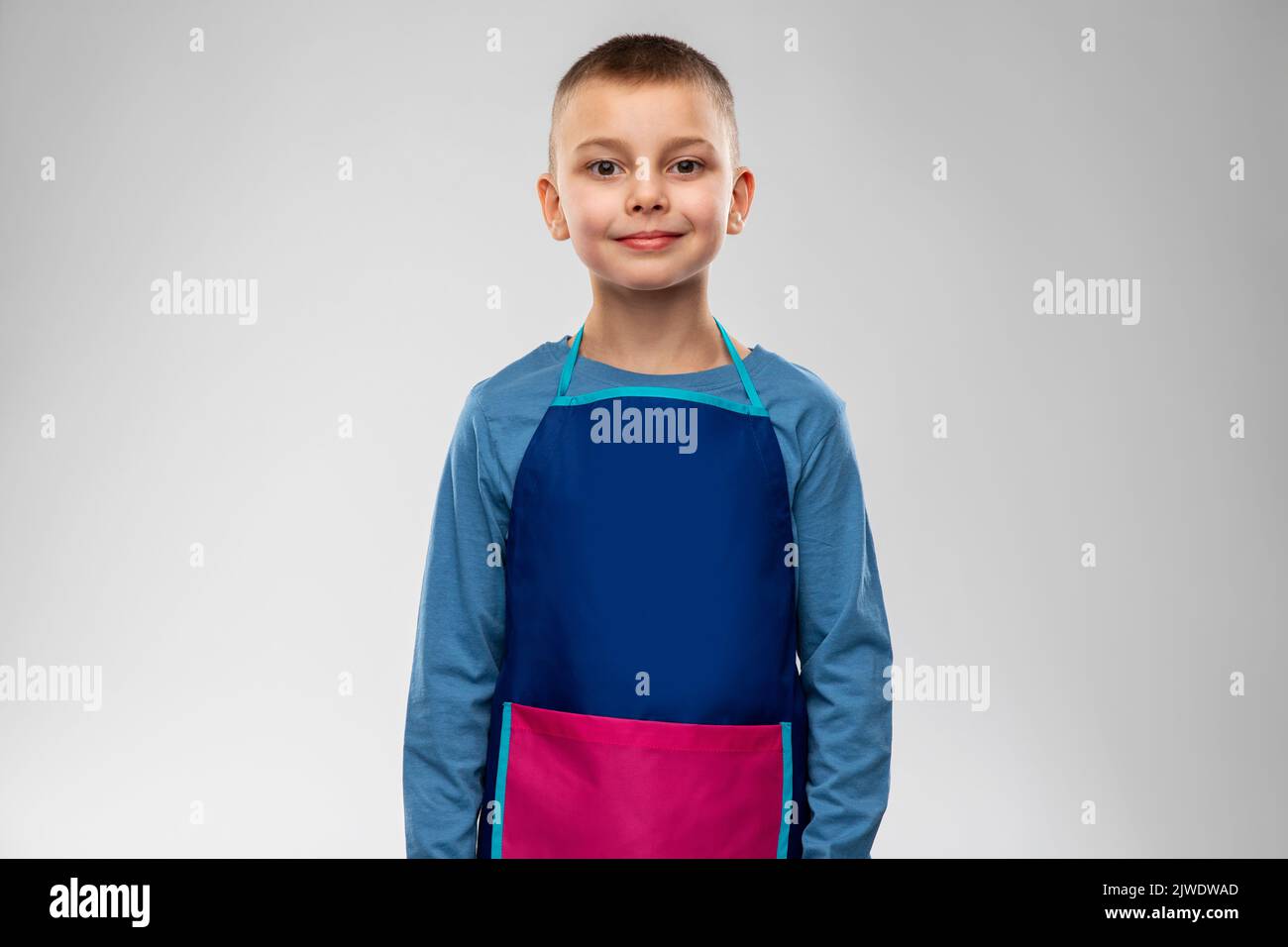 Boy apron hi-res stock photography and images - Alamy