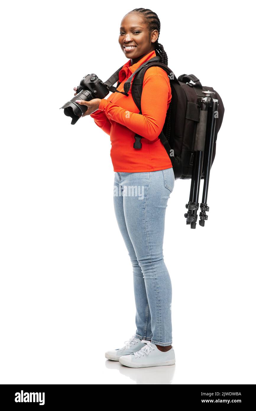 Woman with camera and tripod hi-res stock photography and images - Alamy