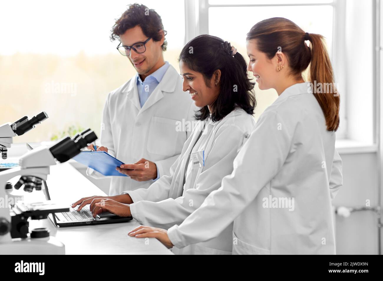 Chemist scientist woman typing biochemistry hi-res stock photography and images - Alamy
