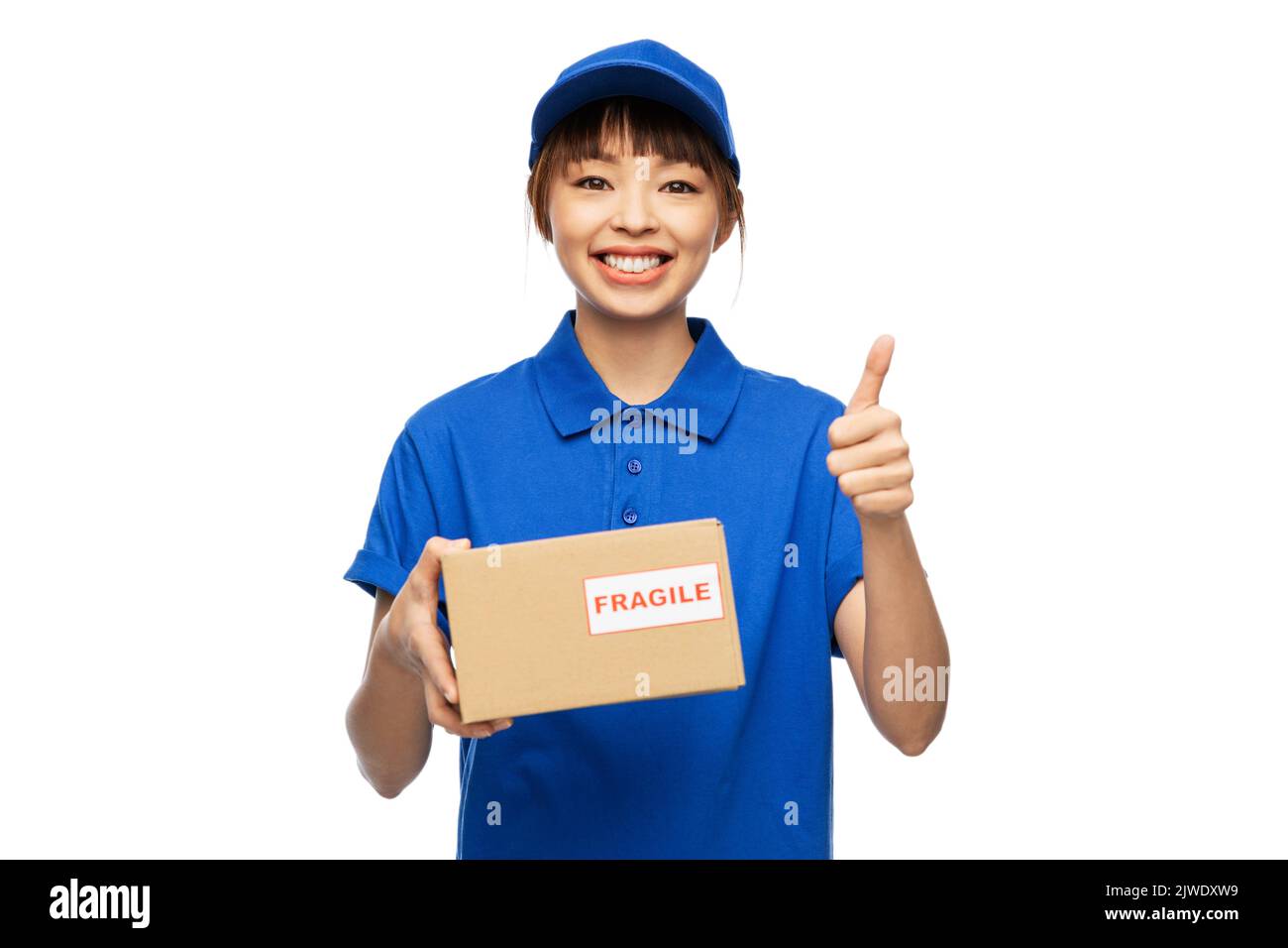 delivery woman with parcel box showing thumbs up Stock Photo - Alamy