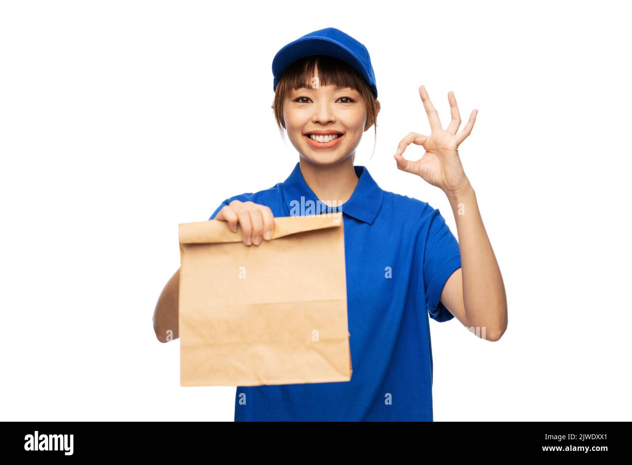 delivery woman with paper bag showing ok sign Stock Photo - Alamy