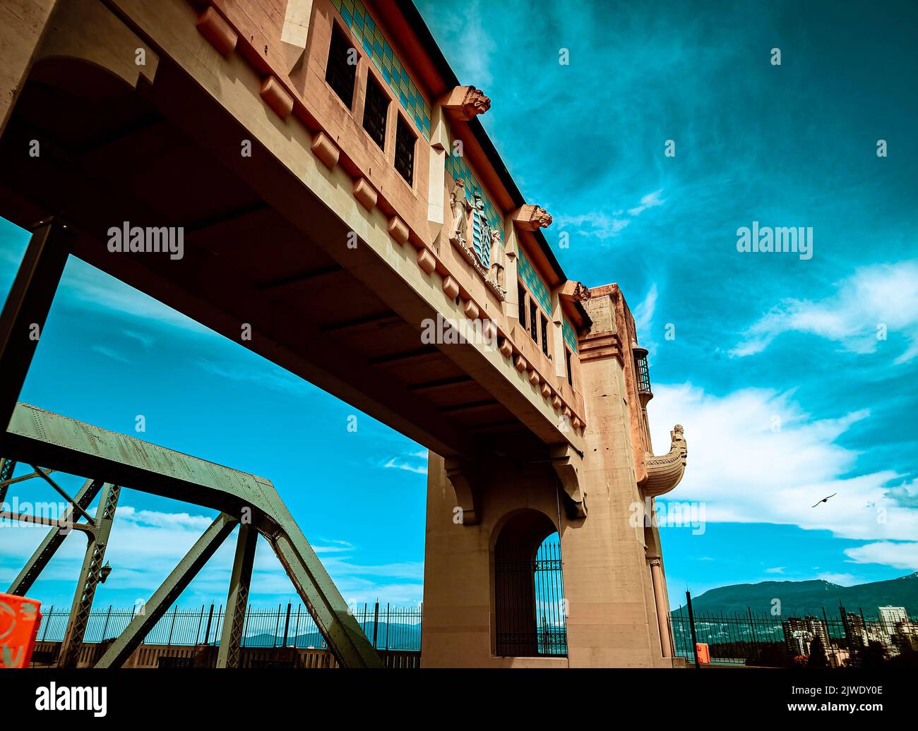 A scenic view of Burrard Street Bridge in cloudy sky background in ...