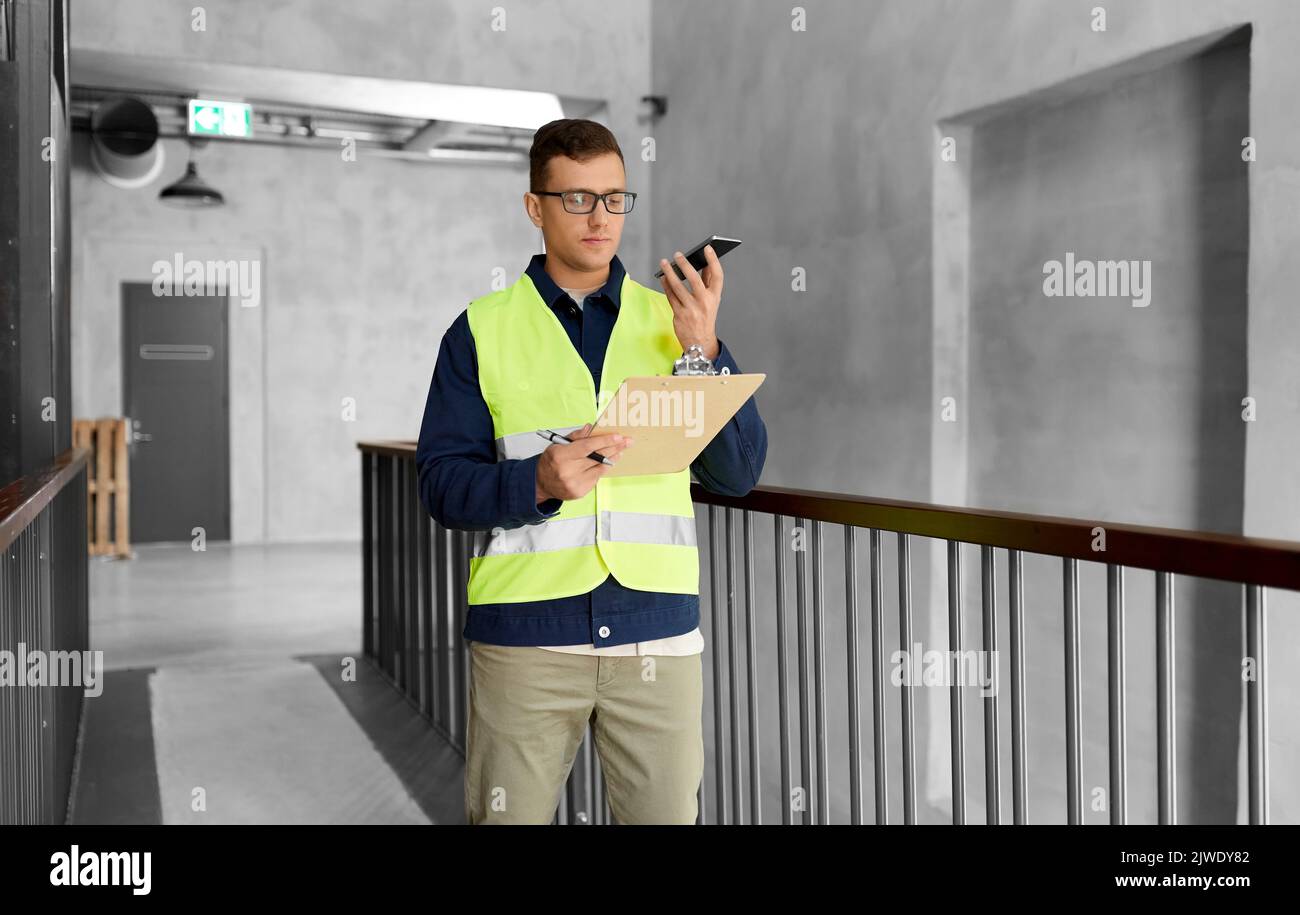 Male supervisor clipboard using hi-res stock photography and images - Alamy