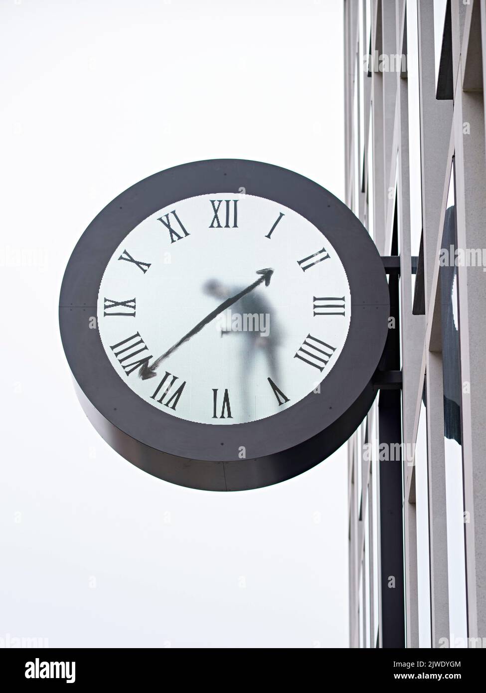 Oversized facade clock with figure painting time. 50 Eastbourne Terrace ...