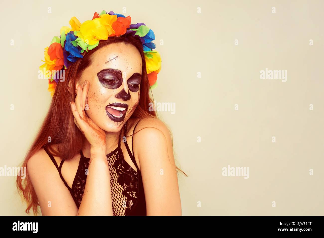 Halloween party, girl in costume and with halloween make-up. A girl in ...