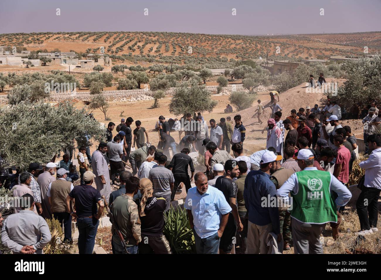 Maar Belit, Syria. 05th Sep, 2022. Syrians bury the body of Fares al ...