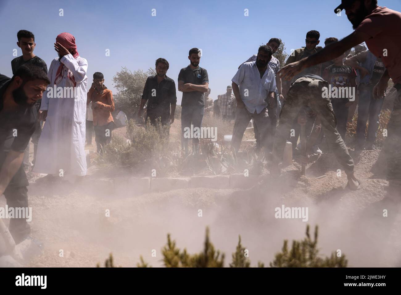 Maar Belit, Syria. 05th Sep, 2022. Syrians bury the body of Fares al ...