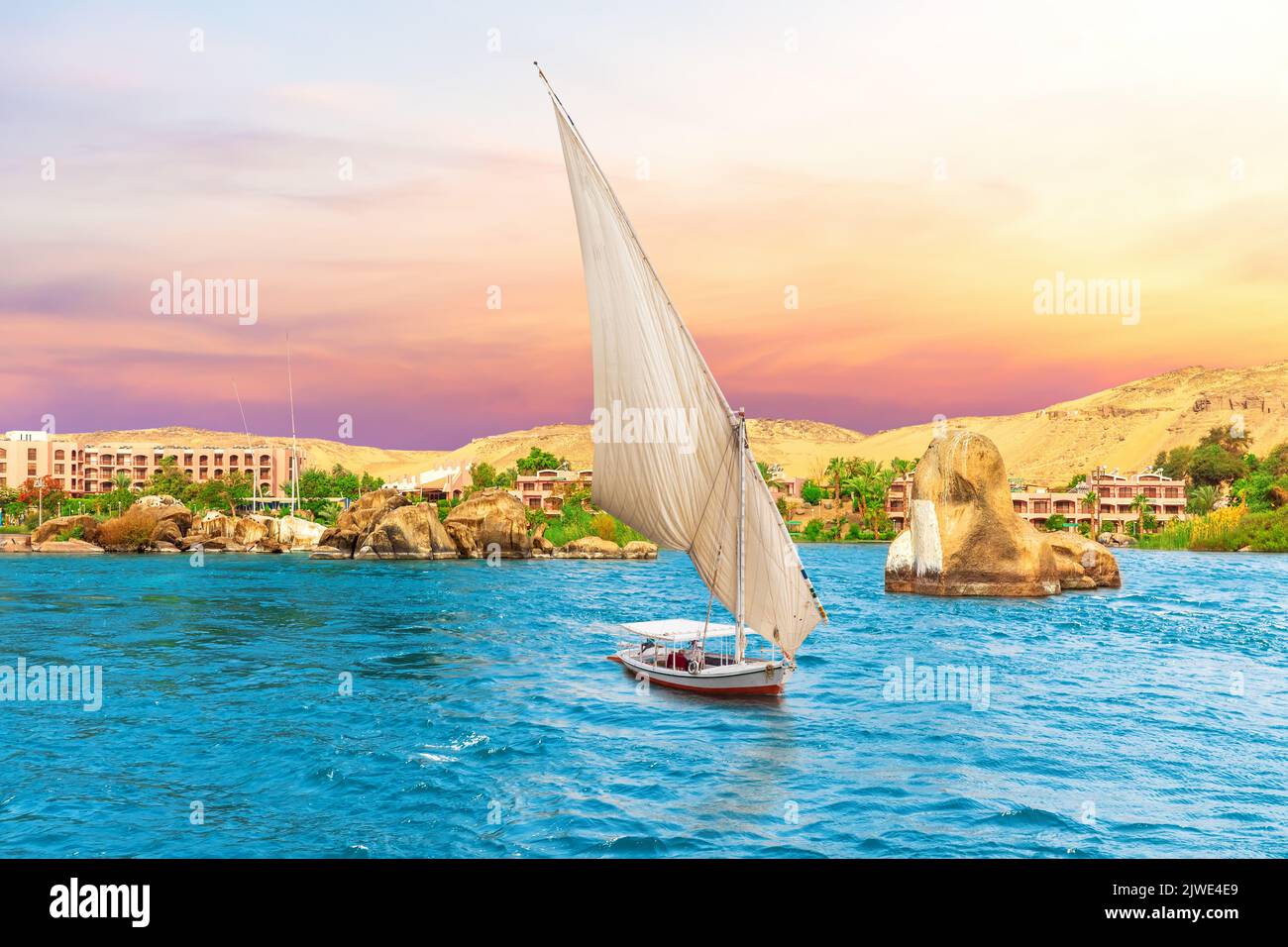 Famous sailboat and the Nile River scenery, sunset view, Aswan, Egypt ...