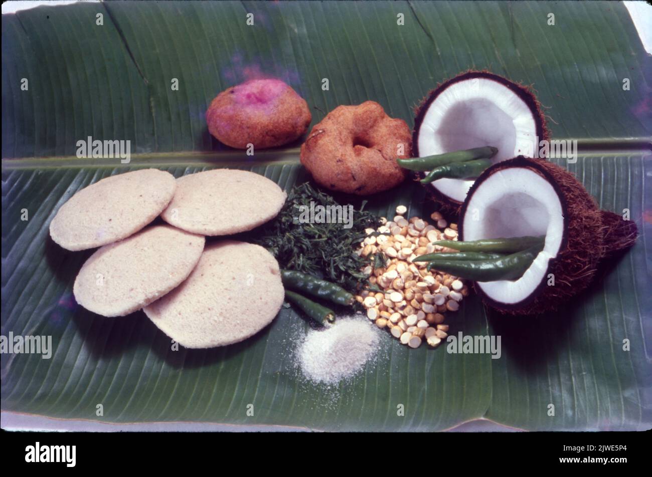 South Indian Snacks, Idli & Medu Vada with Ingradiants on Banana Leaf ...
