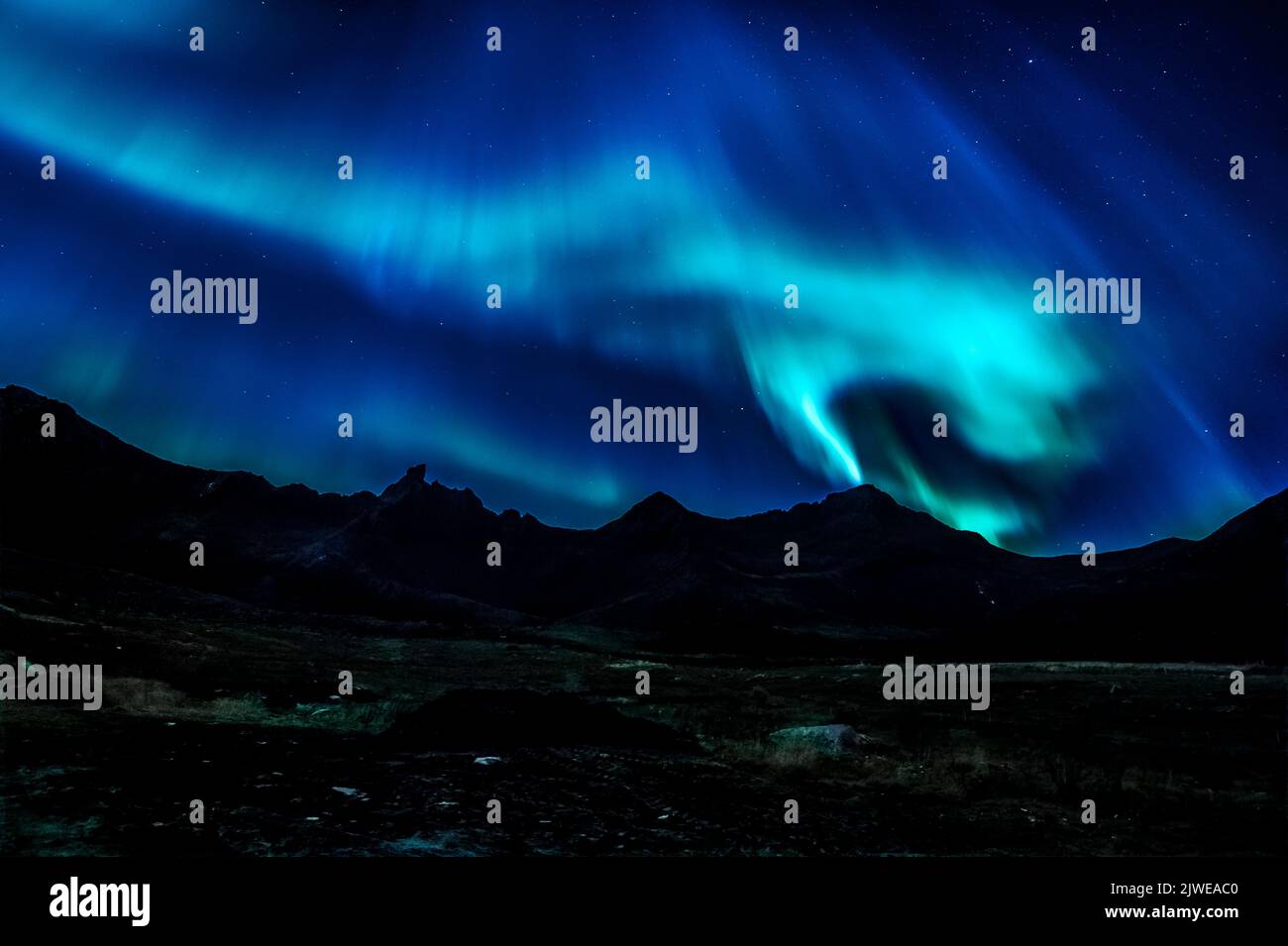 Northern lights over mountain landscape, Lofoten, Nordland, Norway ...