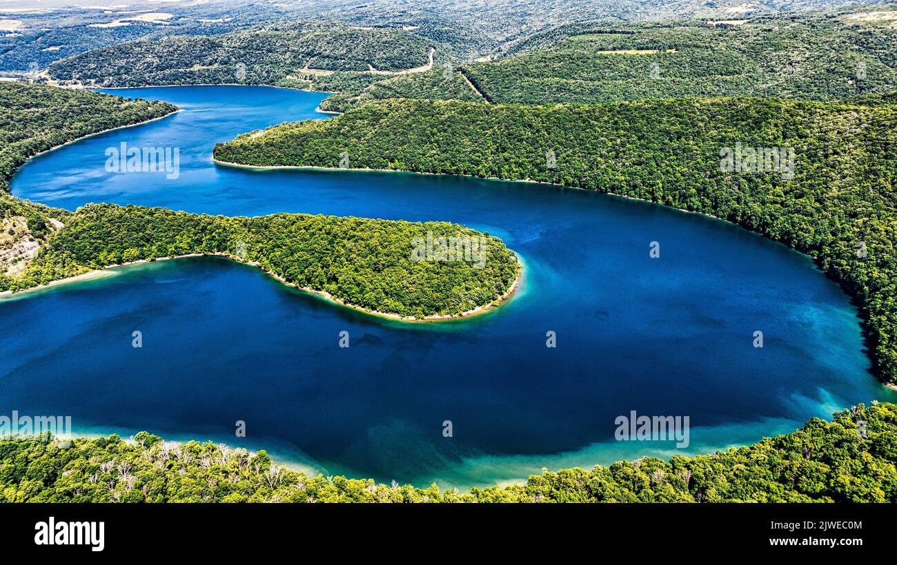 An aerial of Jennings Randolph lake surrounded by woods, West Virginia ...