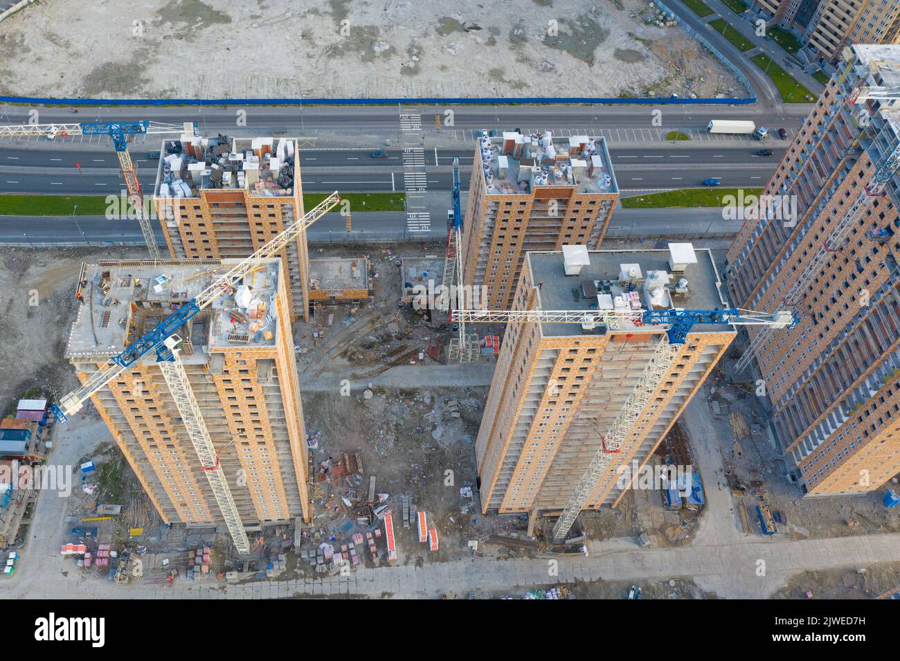 Aerial top view large-scale construction of a residential complex with ...