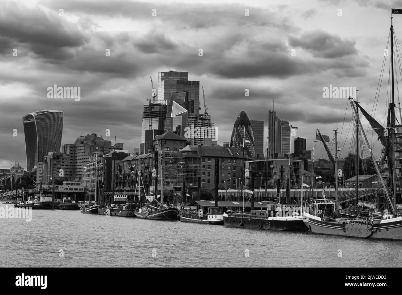 London financial area with the gherkin on the river thames, in the city ...