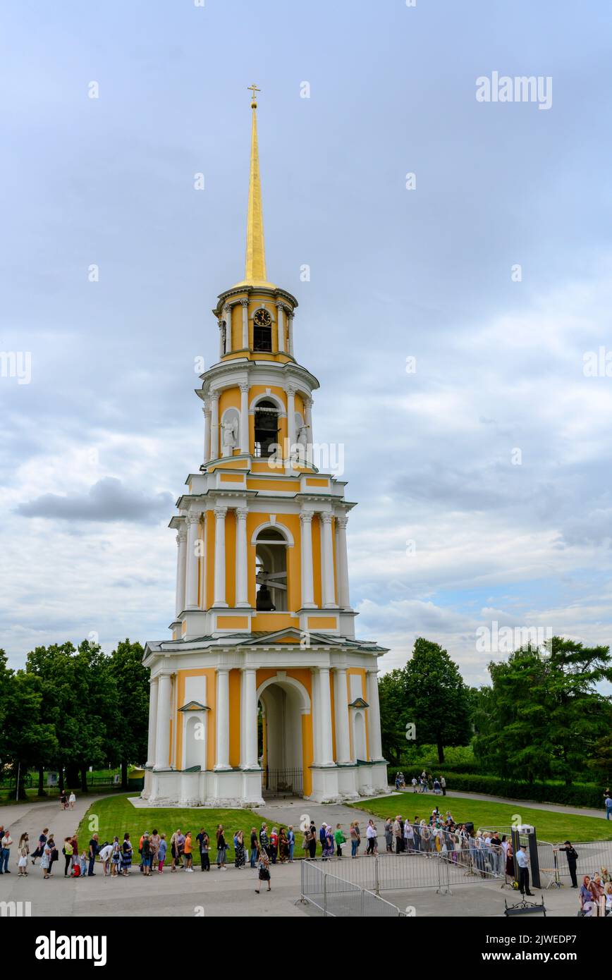 A queue of pilgrims near the 18th-century bell tower on the territory ...