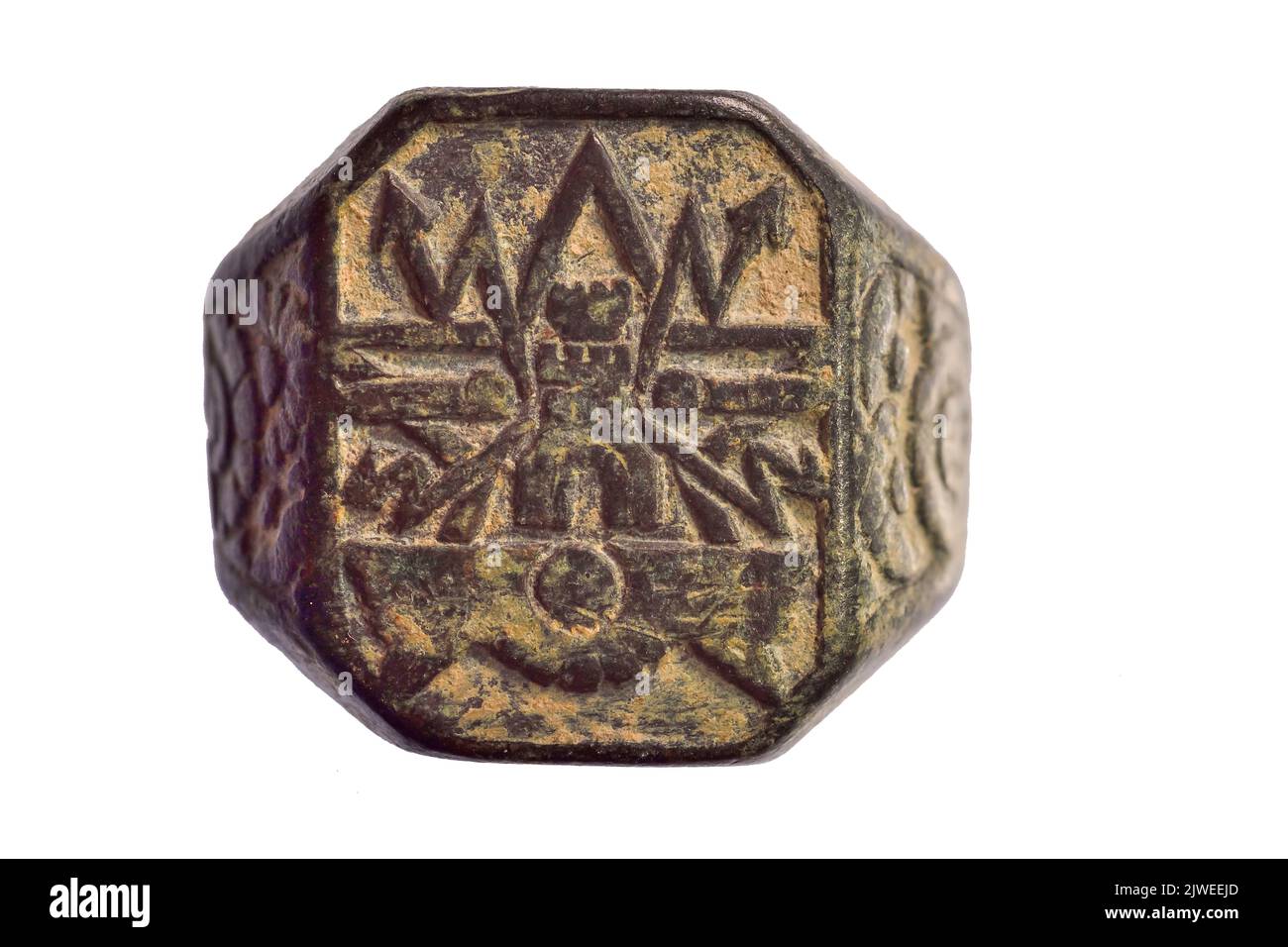 Ancient bronze ring with castle symbols with two rays Stock Photo - Alamy