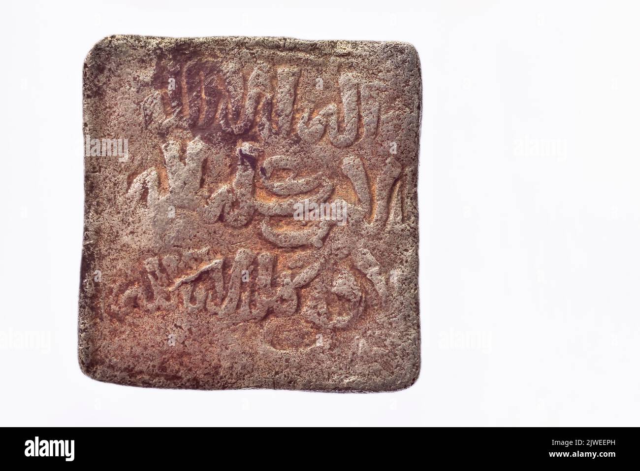Nasrid silver dirham. Square silver coin from the kingdom of Granada ...