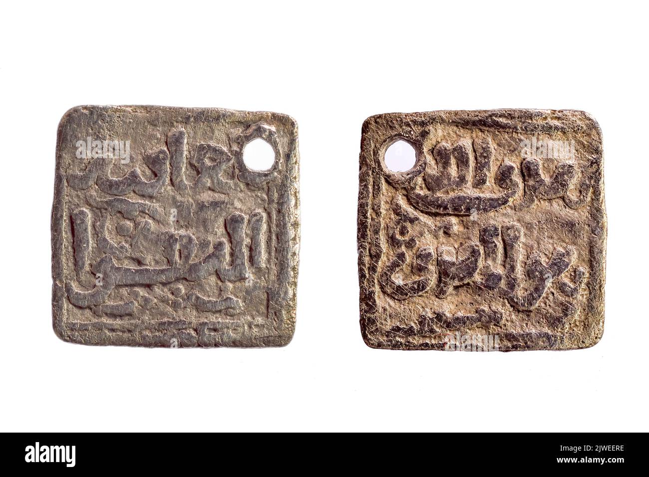 Nasrid silver dirham. Square silver coin from the kingdom of Granada ...