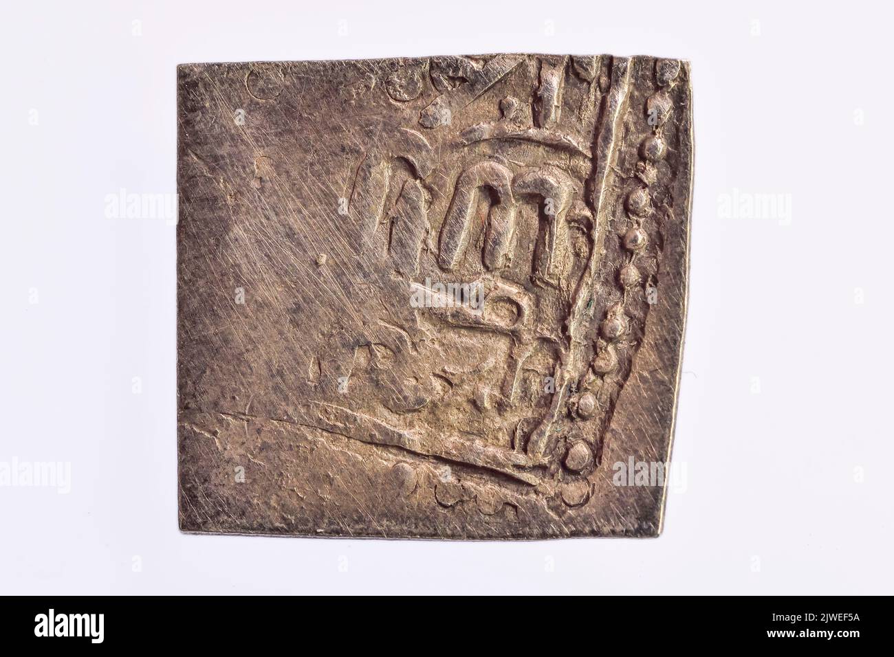 Nasrid silver dirham. Square silver coin from the kingdom of Granada ...