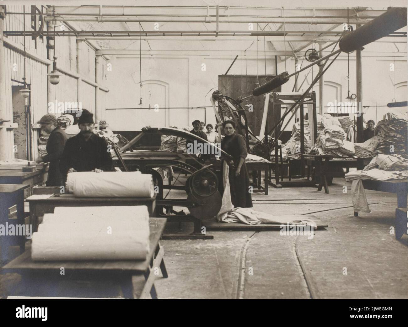 Łódź. Workers at a textile factory hall.. Warszawska Agencja ...
