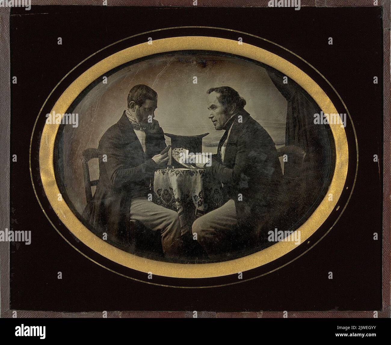 Portrait of two men playing cards. unknown, photographer Stock Photo ...