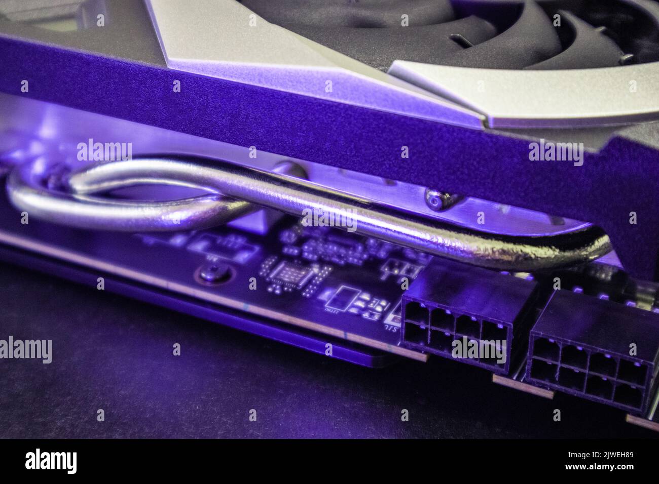 Gpu graphics or video card cooling system close-up in purple light, PC ...