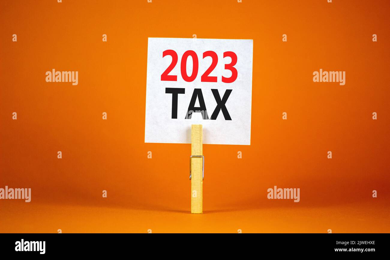2023 tax new year symbol. White paper with words 2023 tax, clip on ...