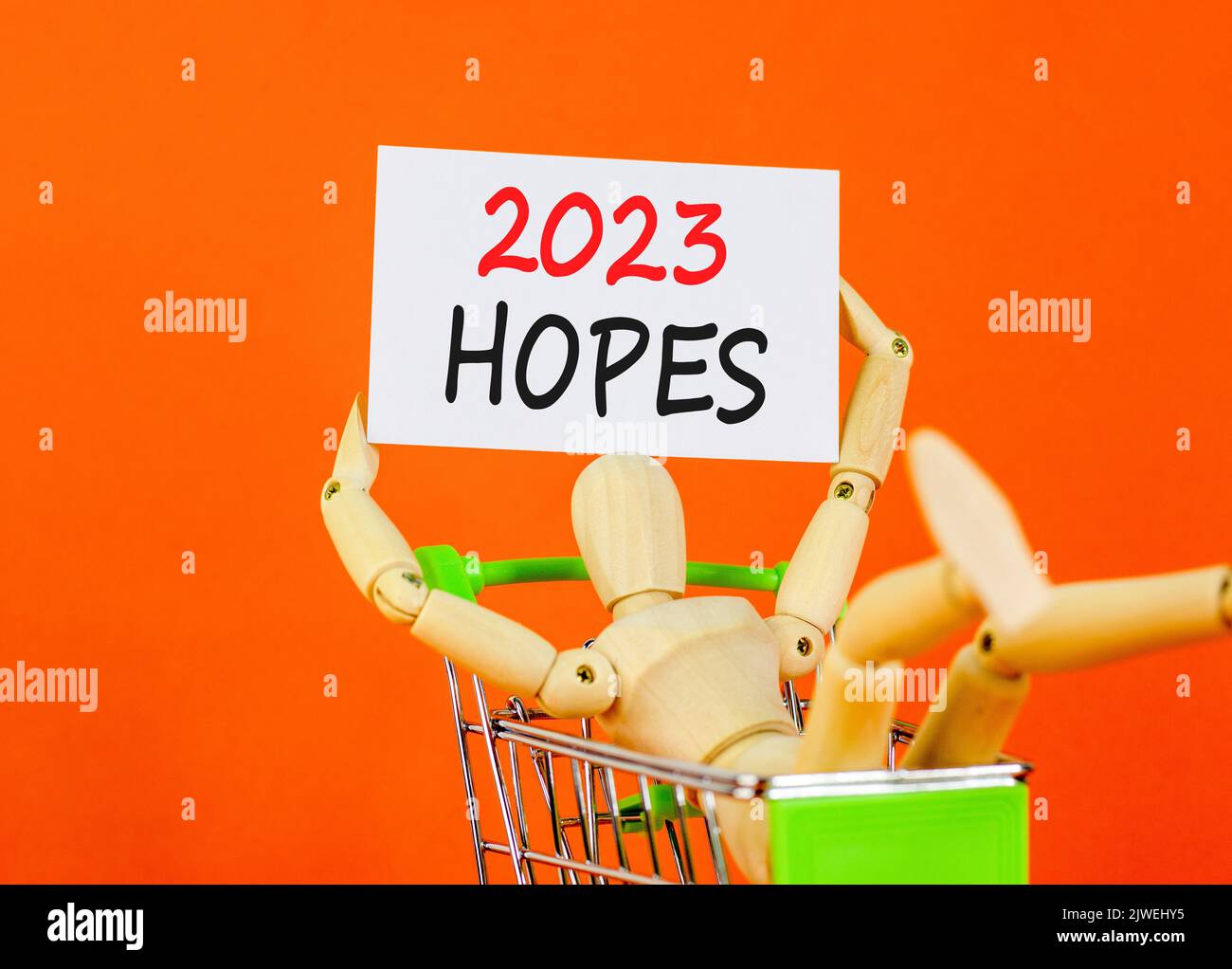 2023 Hopes symbol. White paper with words 2023 Hopes, human model in ...