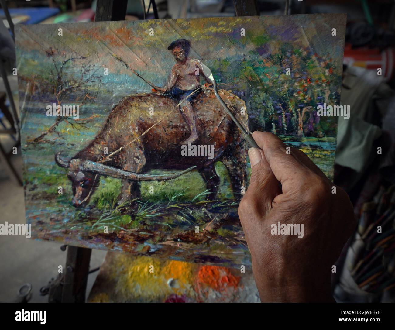 Oil painting Children riding buffalo in the provinces in Thailand Stock ...