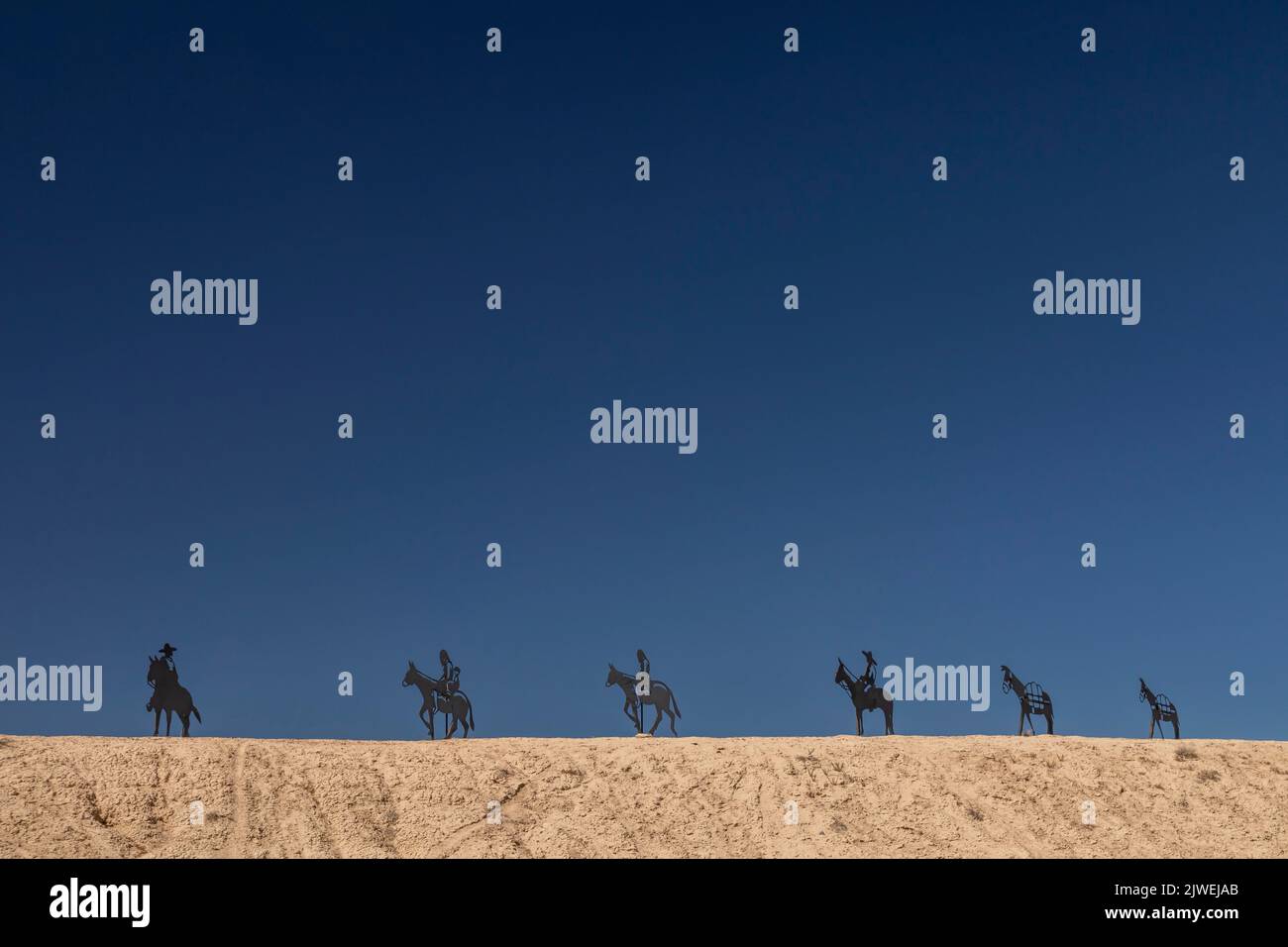 Green River, Utah - Metal sculptures of horse and burro riders at the ...