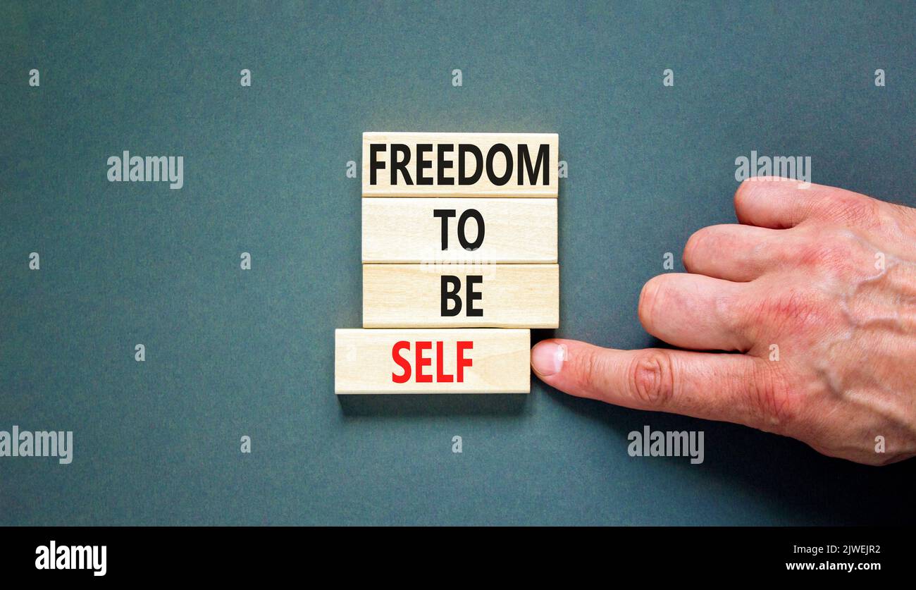 Freedom to be self symbol. Concept words Freedom to be self on wooden ...