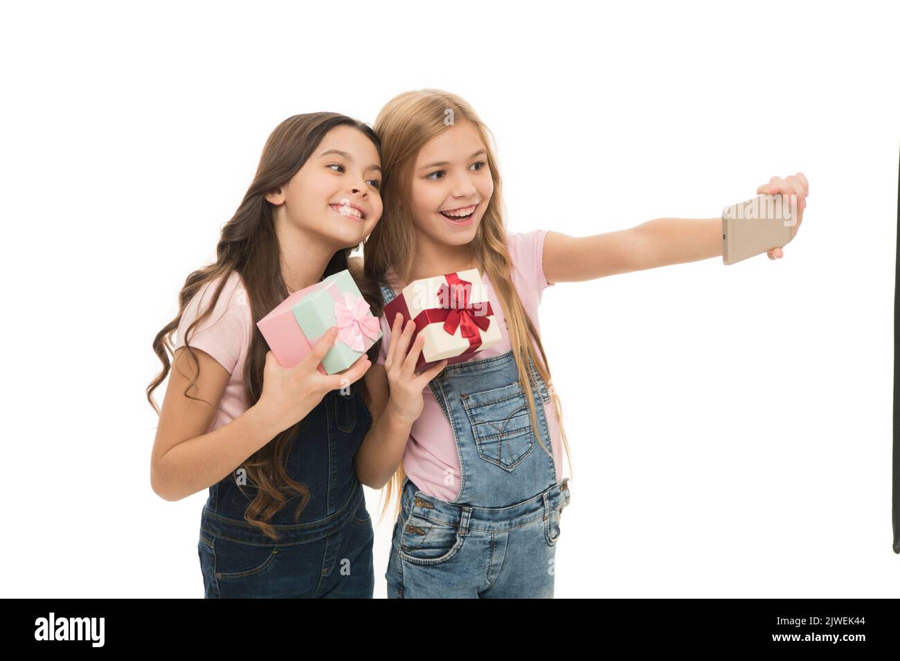 Taking selfie. How make professional unboxing. Girls cute kids shooting ...