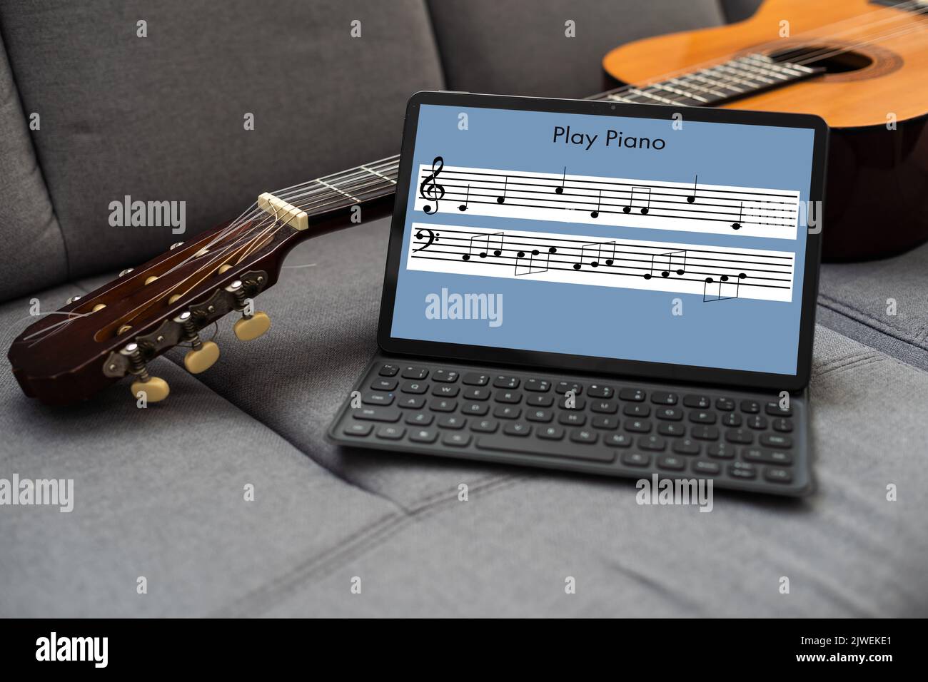 Online guitar tutor hi-res stock photography and images - Alamy