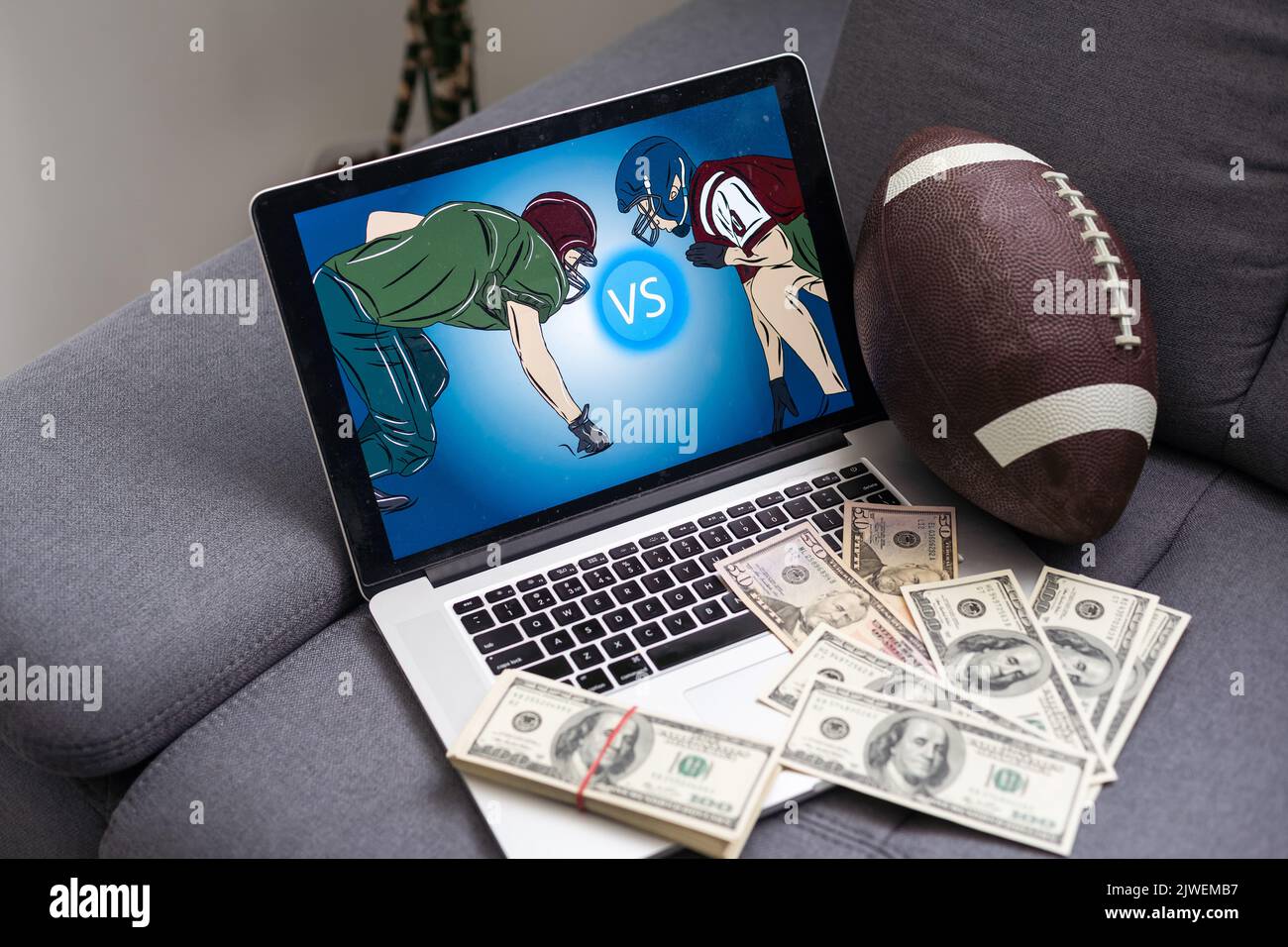 Football ball and money. video game at home Stock Photo - Alamy
