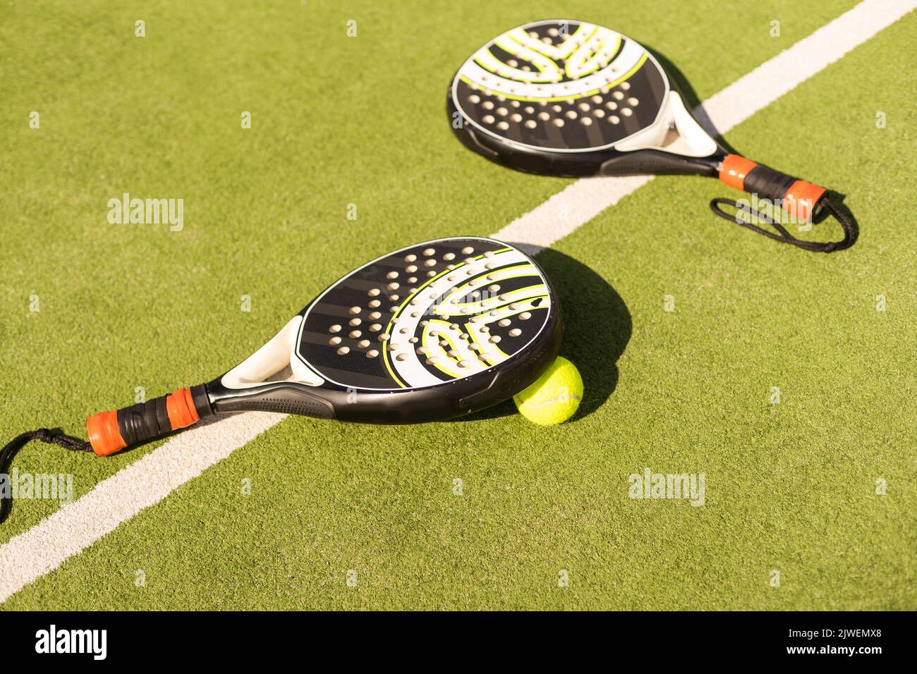 Paddle tennis objects and court Stock Photo - Alamy