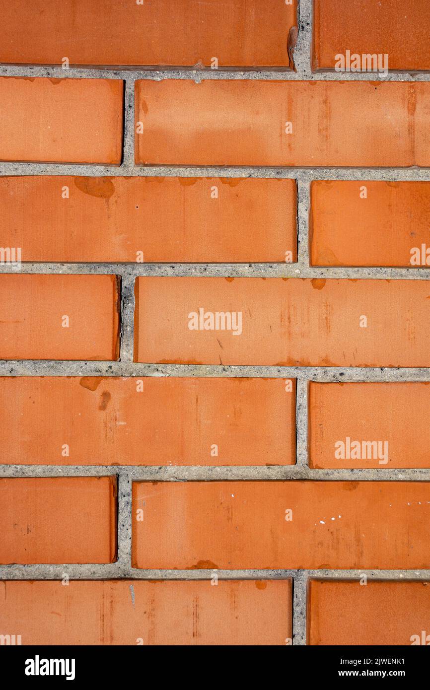 Vertical background of red brickwork for grouting. Backdrop Stock Photo ...
