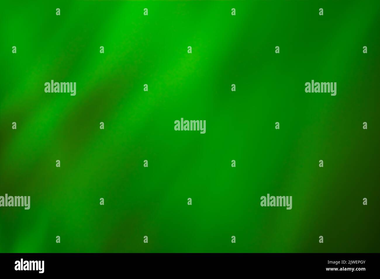 Abstract wavy background, silky green fabric with soft blur and ...