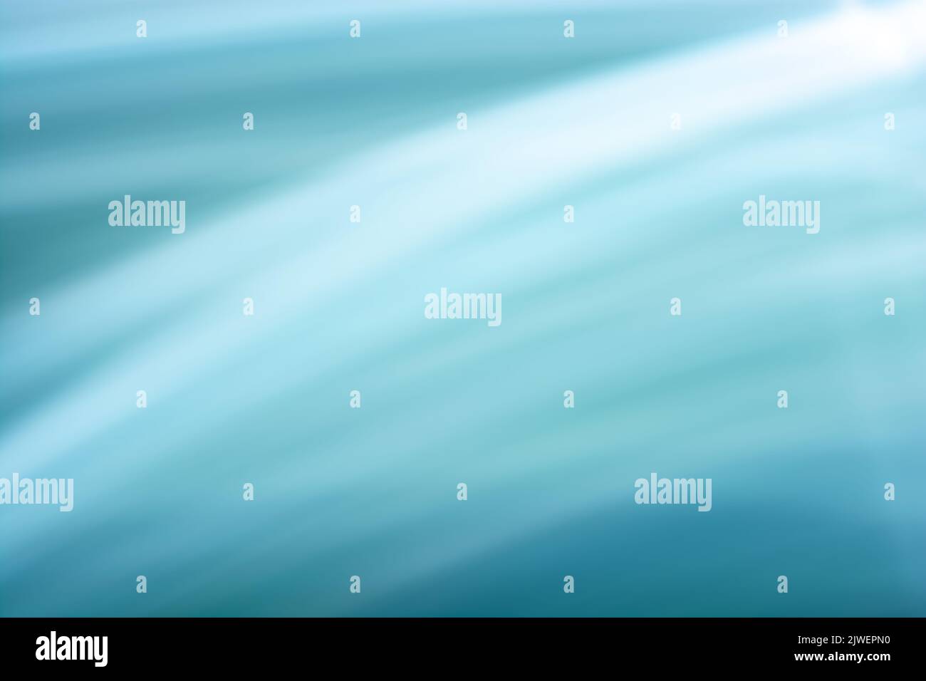 Abstract background banner with a slight blur of waves and lines in a ...