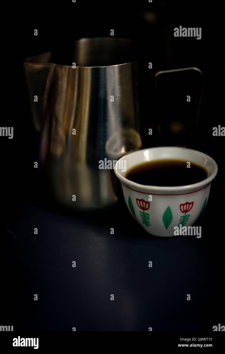 Authentic Ethiopian coffee cup, and stainless pitcher Stock Photo - Alamy