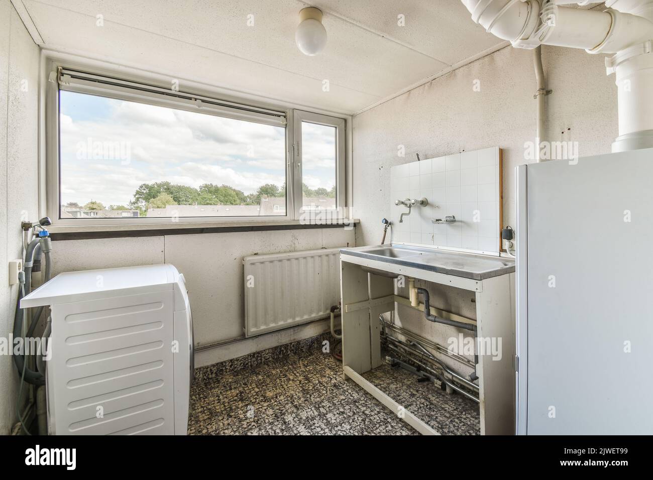 Boiler room of an apartment building with pipes and metering devices. A ...
