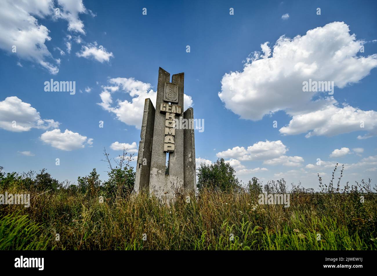 KOMAR, UKRAINE - AUGUST 30, 2022 - A road sign is seen on the outskirts ...